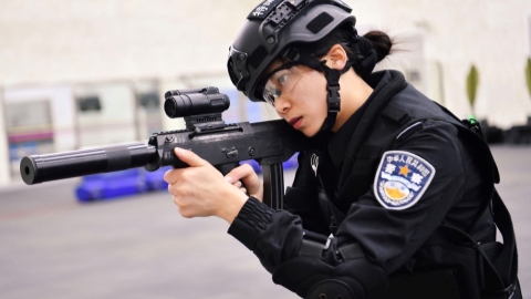 Athlete becomes crackerjack SWAT woman police officer