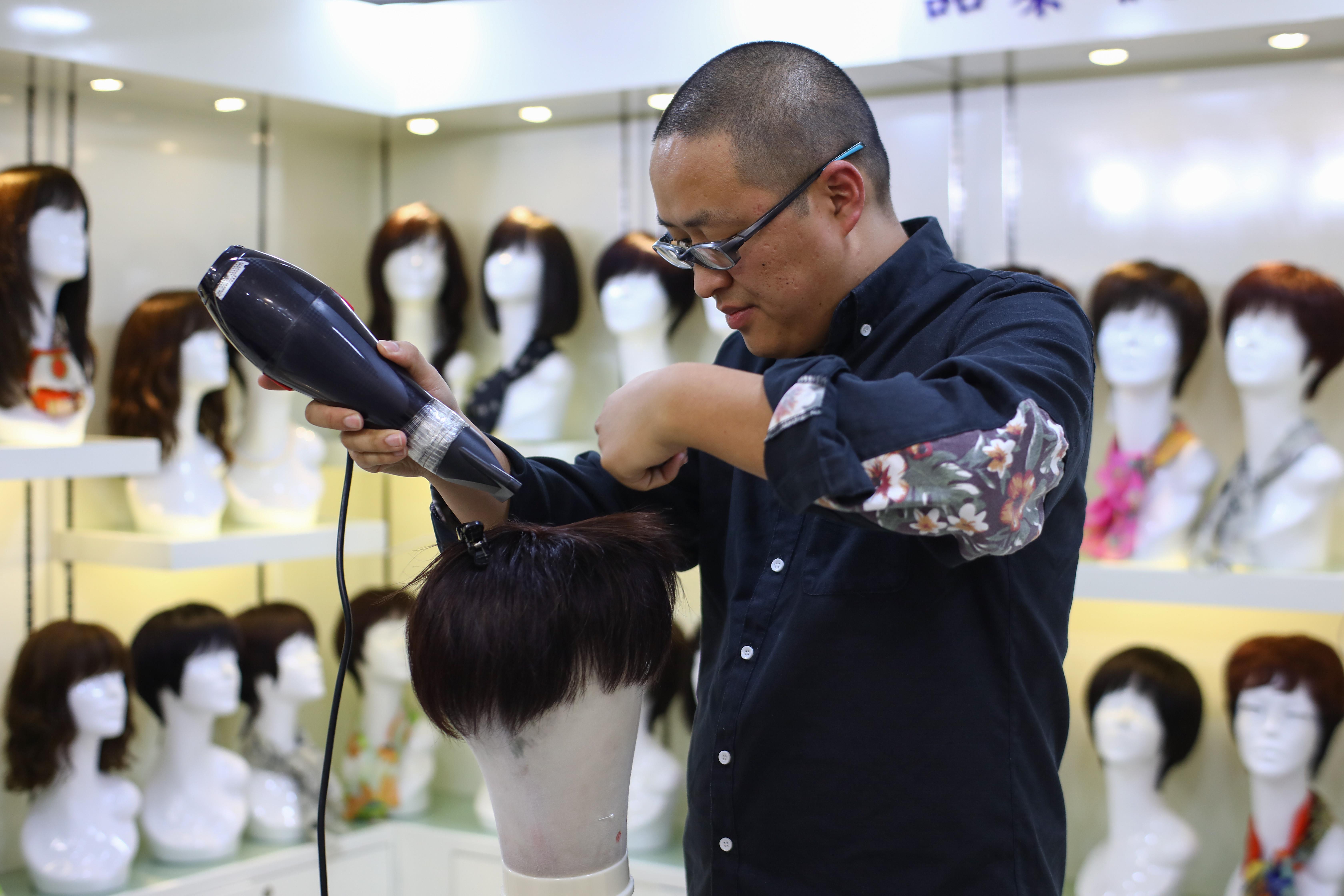 When the wigs come off: The story of Qin and his little shop - SHINE News