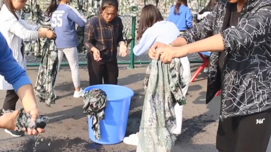University students clean military uniforms, ready for donation - SHINE ...