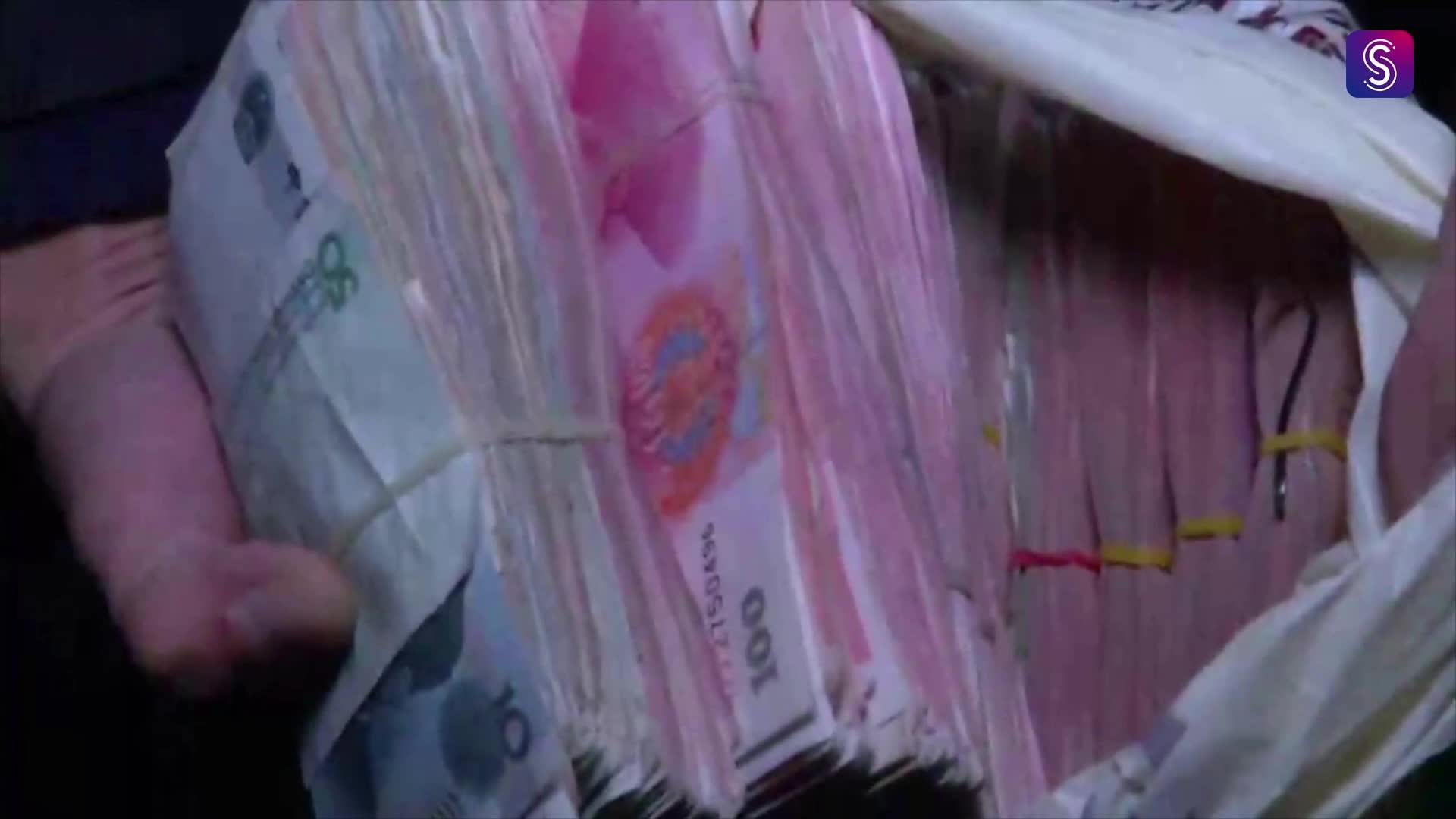 Taxi passenger finds shoe box filled with cash - SHINE News