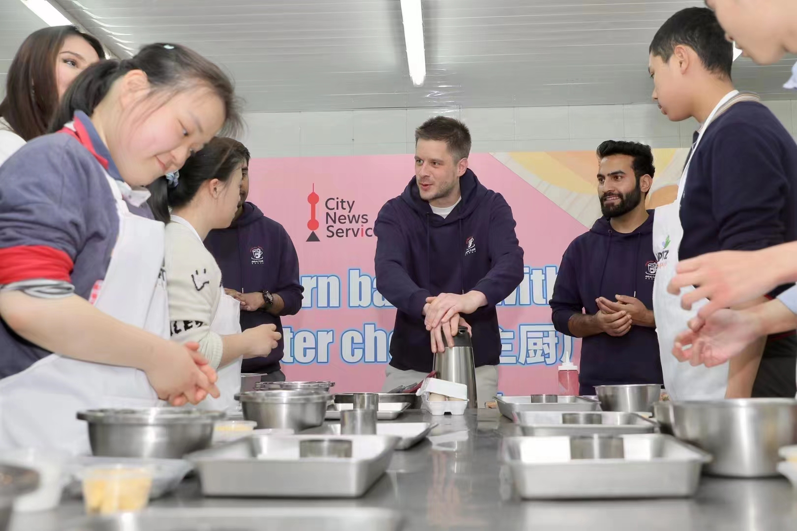 Global volunteers come together to bake and learn with special needs ...