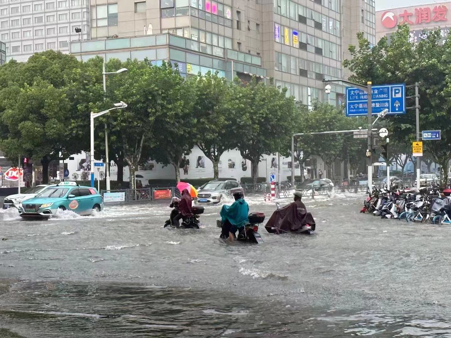 Heavy rain hits Shanghai, with heat set to return this weekend - City ...