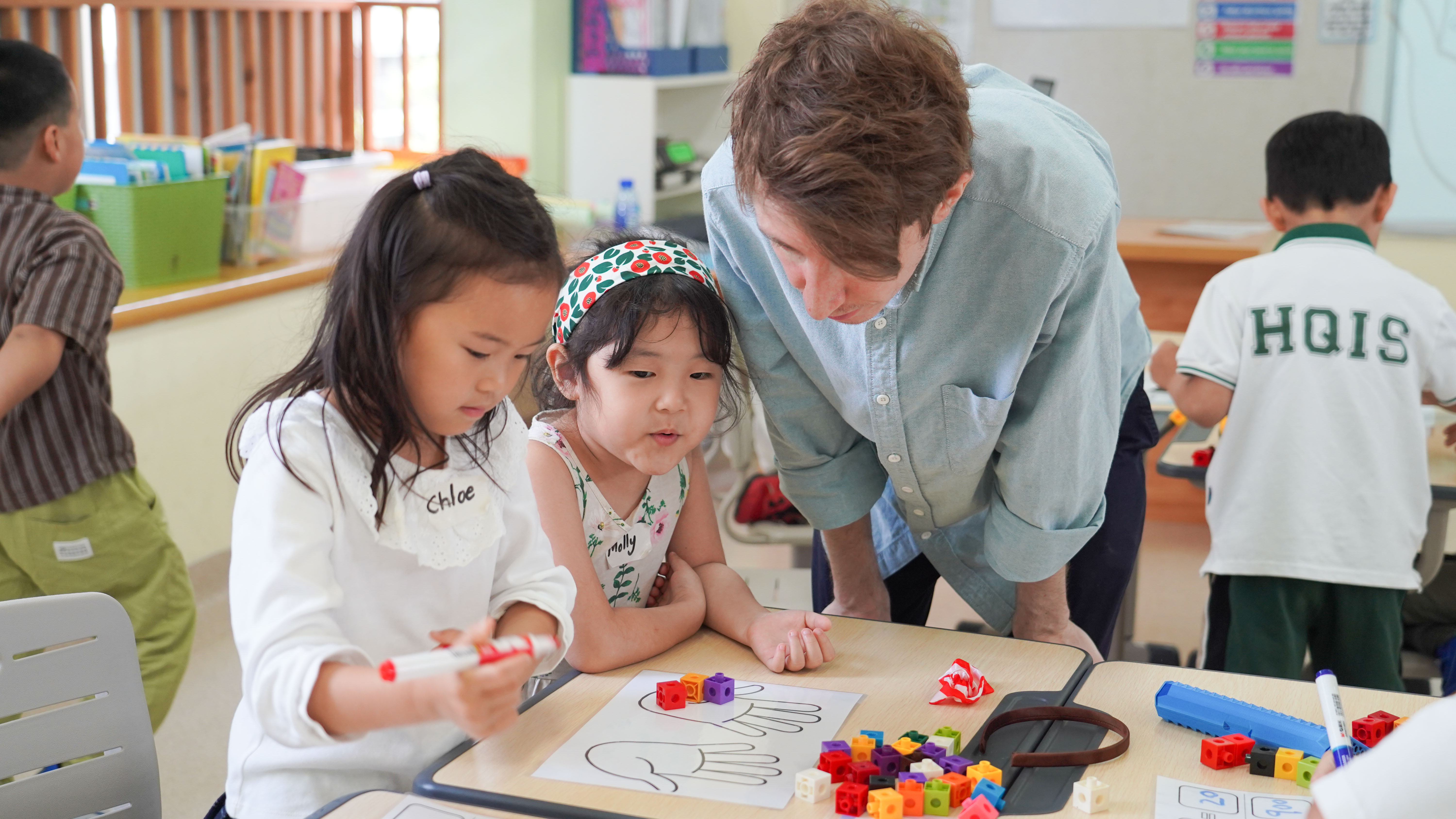 Backpacks, smiles and new beginnings at HQIS - SHINE News