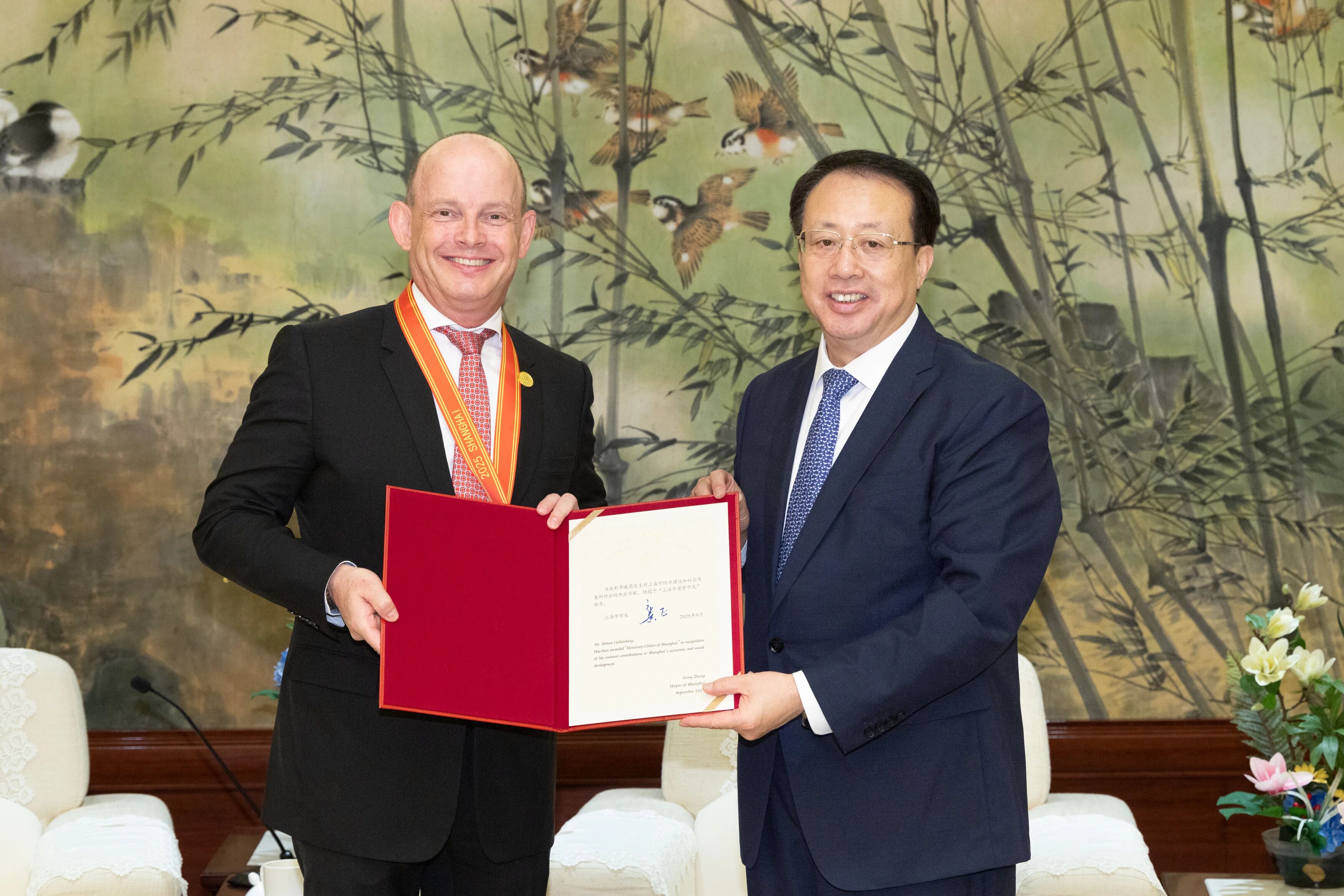 2 expatriates awarded honorary citizenship - City News Service